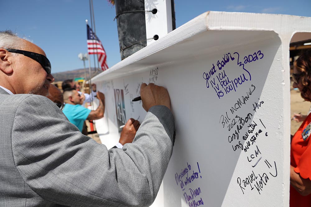 Southwest Healthcare celebrates the topping out of the final beam for ...
