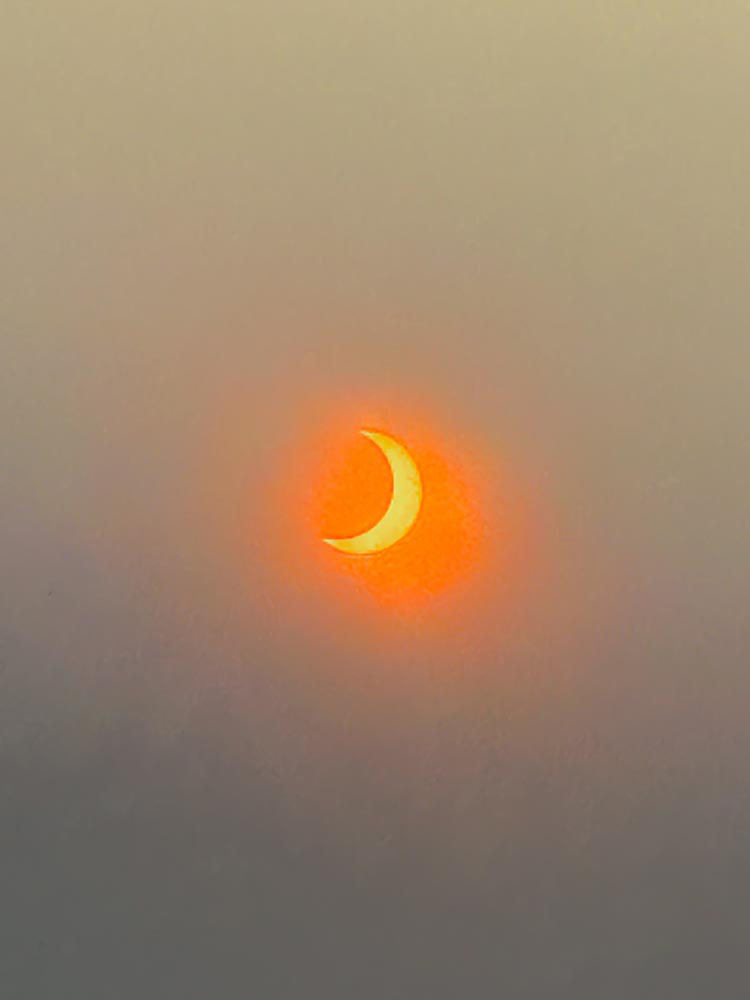 Partial solar eclipse seen over local skies | Valley News