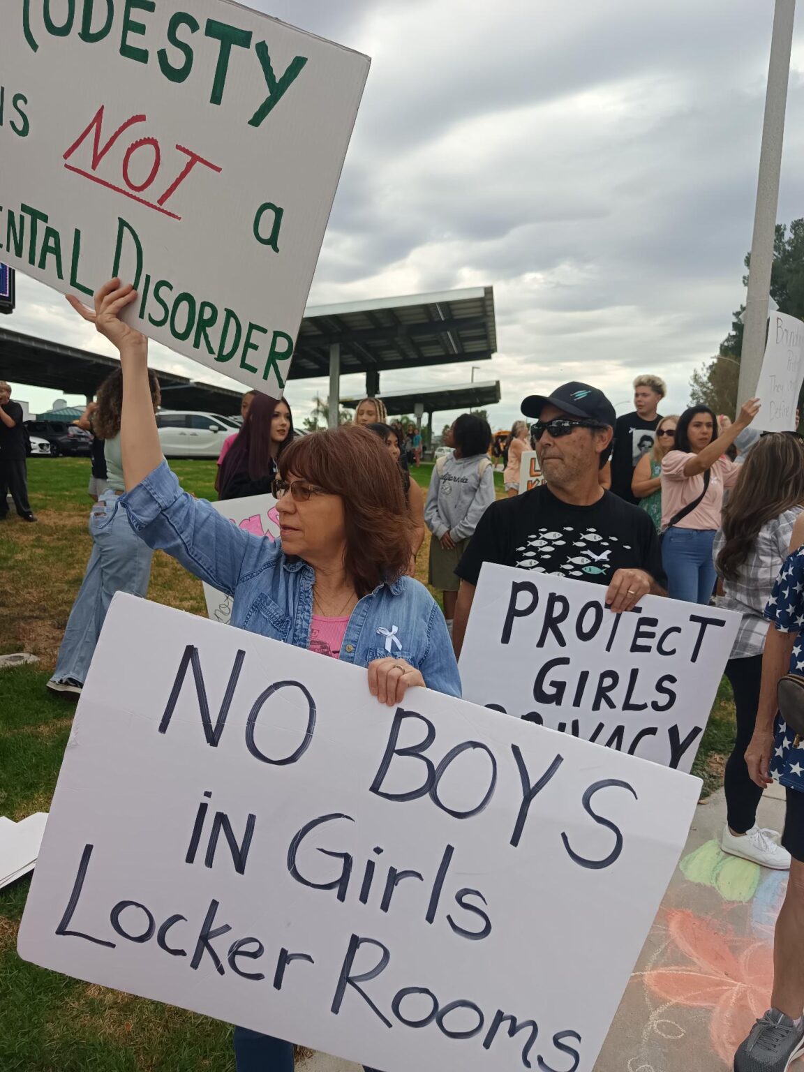 Parents and students walkout at James L. Day Middle School over locker ...