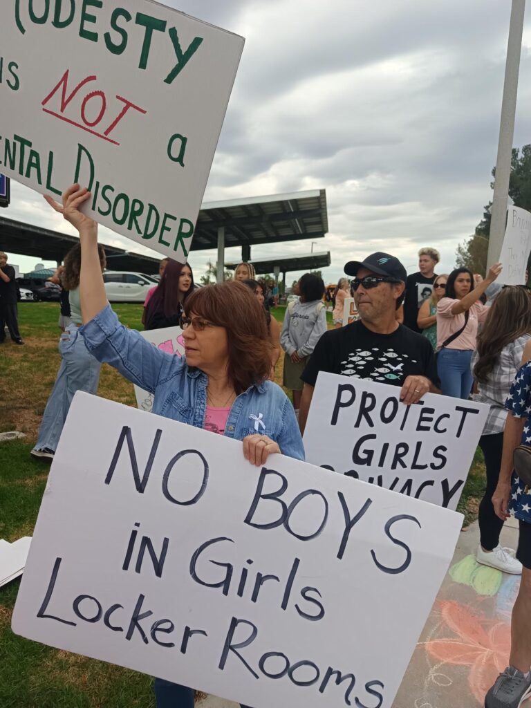 Parents and students walkout at James L. Day Middle School over locker room concerns | Valley News