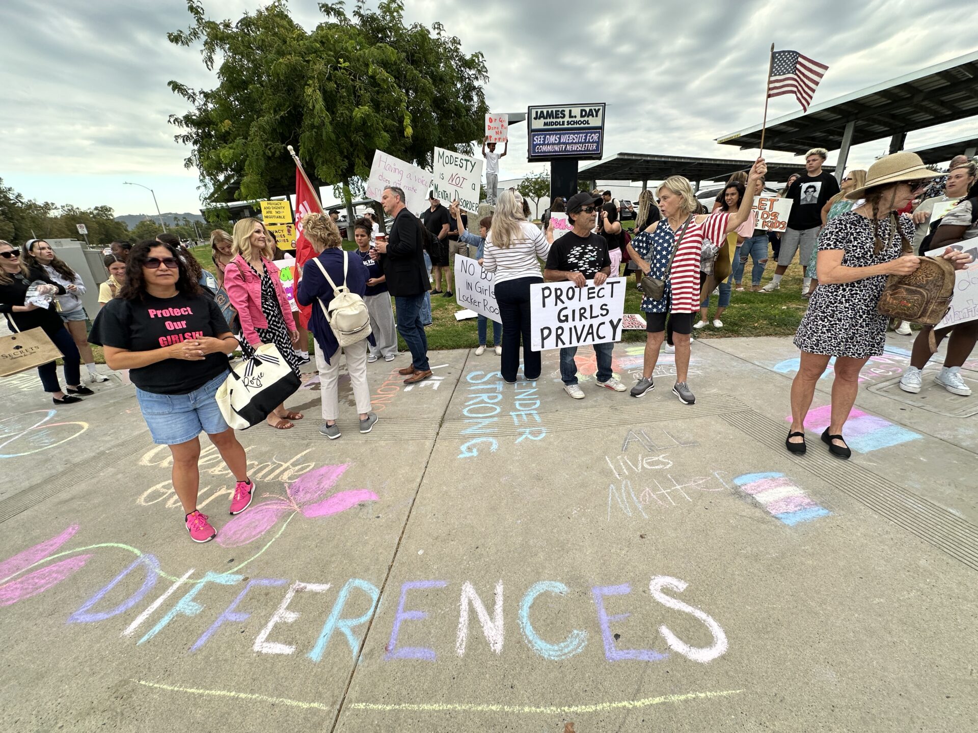 Parents and students walkout at James L. Day Middle School over locker room concerns | Valley News